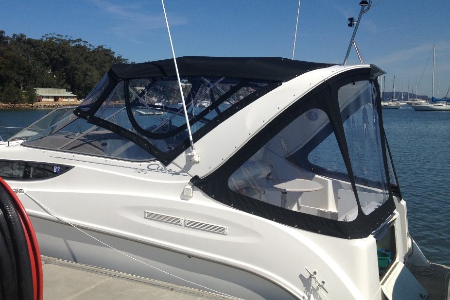 Backdrop covers and enclosure for power boats